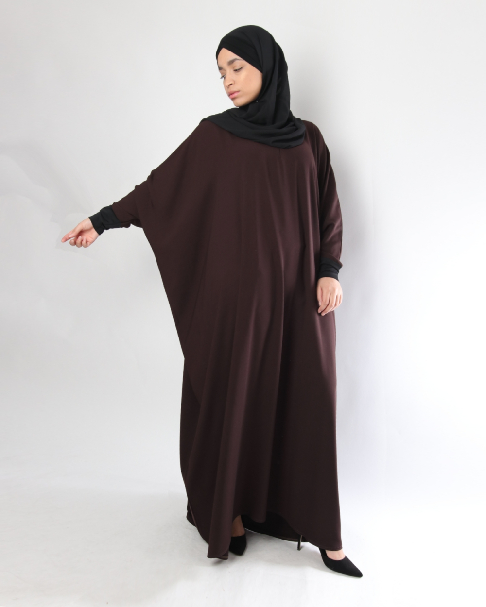 Sejarah Abaya - Baju Gamis Muslimah yang Berbentuk Long Dress Lebar - Dzargon